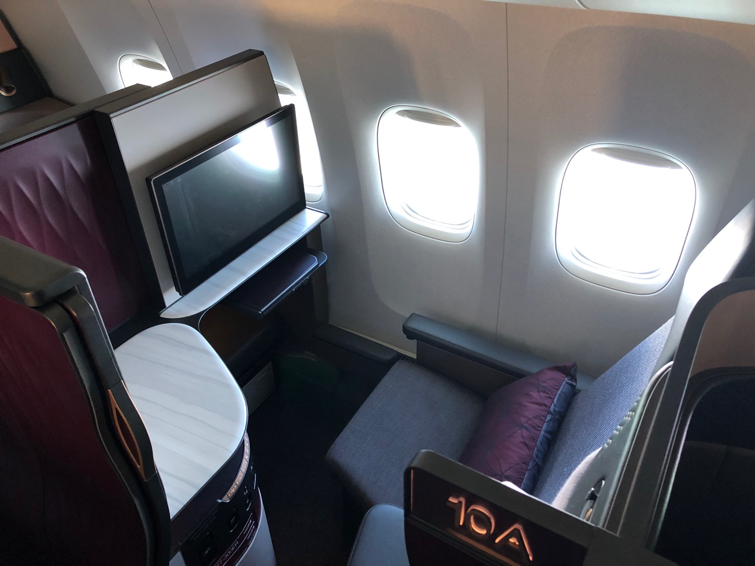 Review: Qatar Airways 777-300ER Qsuite Business Class New York to Doha ...